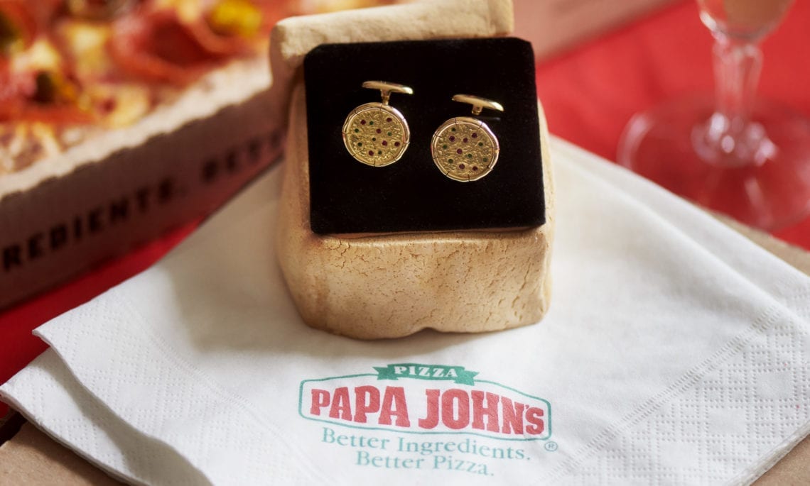 Papa Johns launches 18k gold ‘crust-links’ | Jewellery Focus
